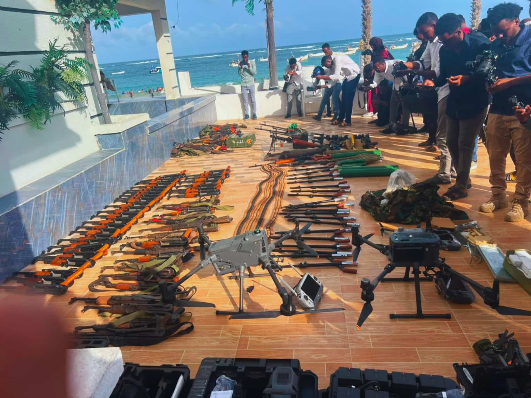 Somali police display 'seized' arms at opposition-linked hotel
